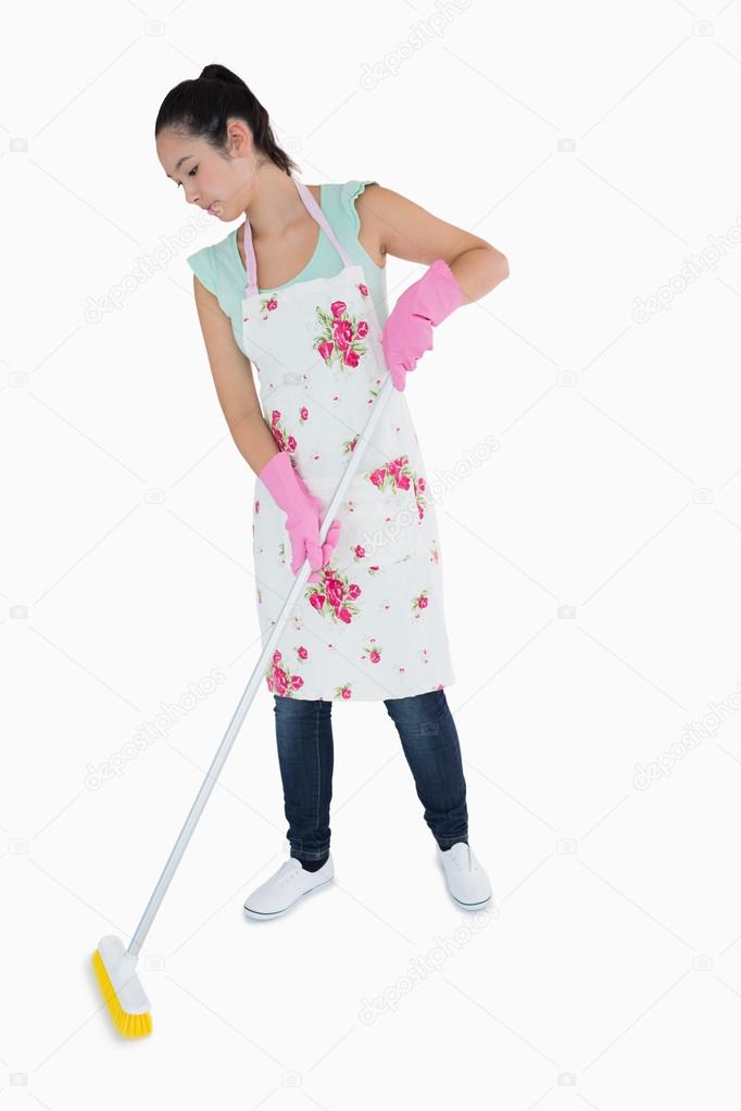 Woman sweeping floor — Stock Photo © Wavebreakmedia #23107414