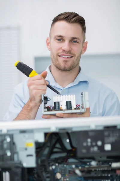 Computer engineer working on cpu part in front of open cpu Stock Photo ...