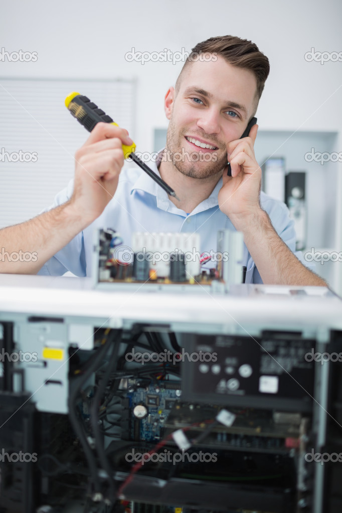 Computer engineer working on cpu part in front of open cpu Stock Photo ...