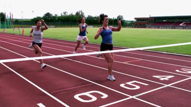 Runners crossing the finish line — Stock Video © Wavebreakmedia #25658513