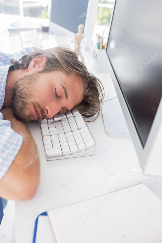 Man napping on his desk Stock Photo by ©Wavebreakmedia 25726349