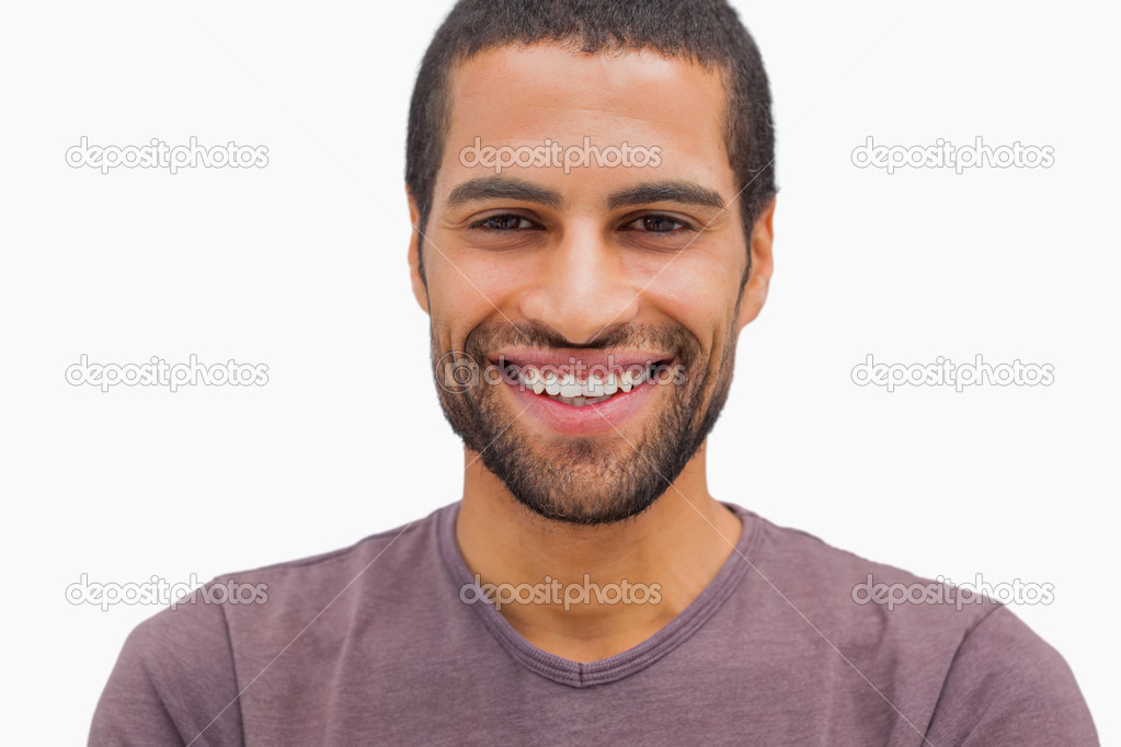Handsome man smiling Stock Photo by ©Wavebreakmedia 25726975