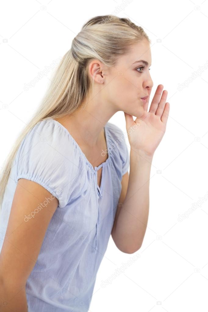 Blonde woman telling a secret — Stock Photo © Wavebreakmedia #28052289