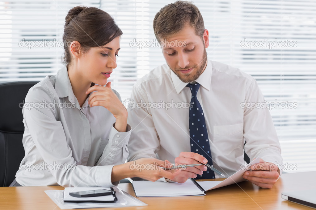 Business people going over documents Stock Photo by ©Wavebreakmedia ...