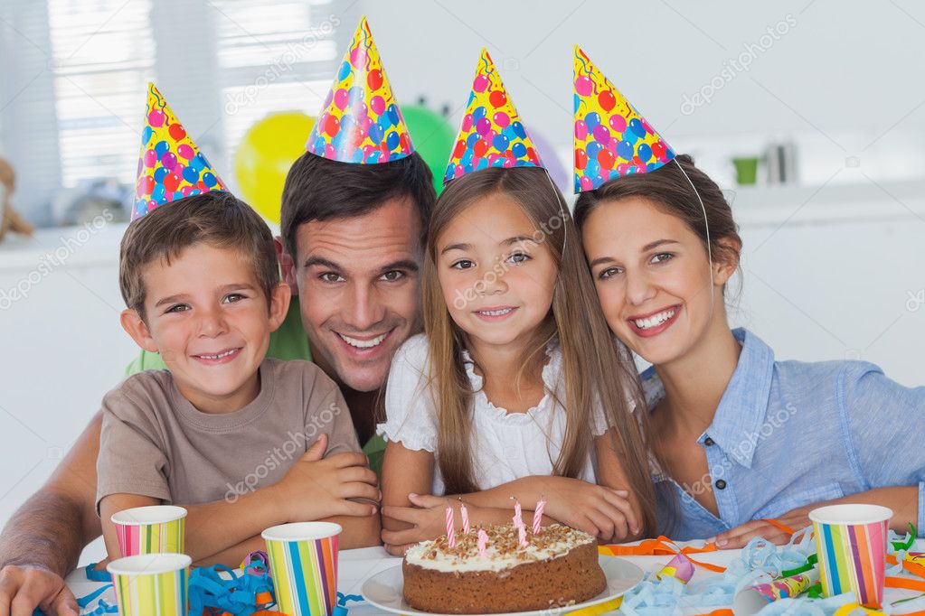 Beautiful family celebrating a party Stock Photo by ©Wavebreakmedia ...