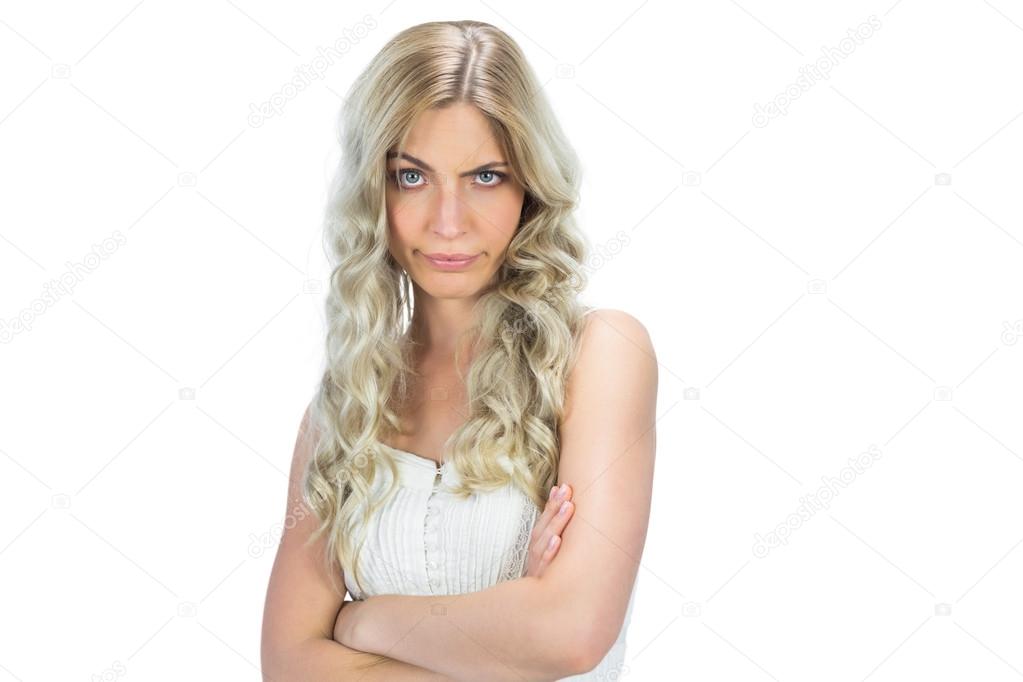 Doubtful model in white dress rising her eyebrow Stock Photo by ...