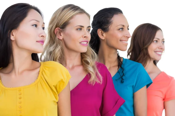 Happy models posing with colorful t shirts Stock Photo by ...