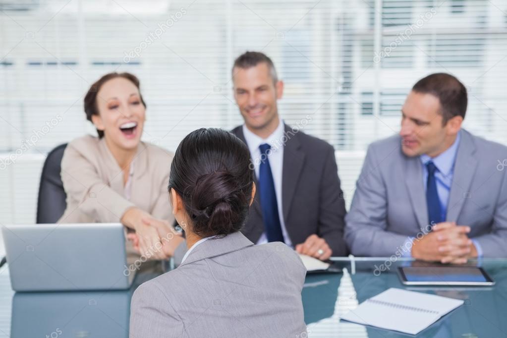 Business team interviewing young applicant — Stock Photo ...