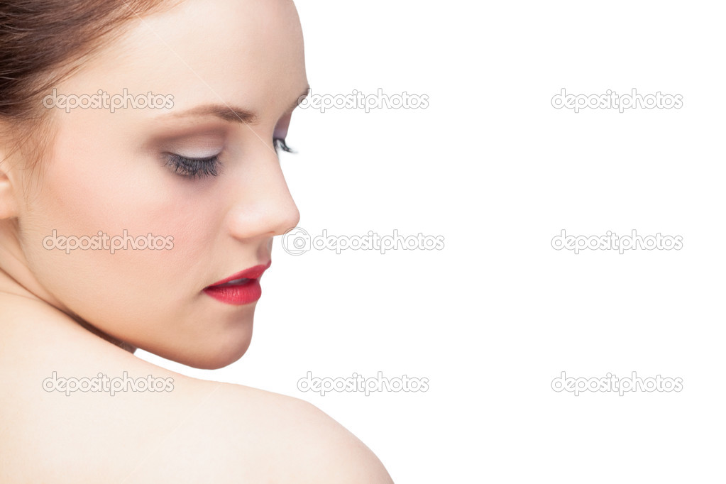 Attractive young model looking over shoulder Stock Photo by ...