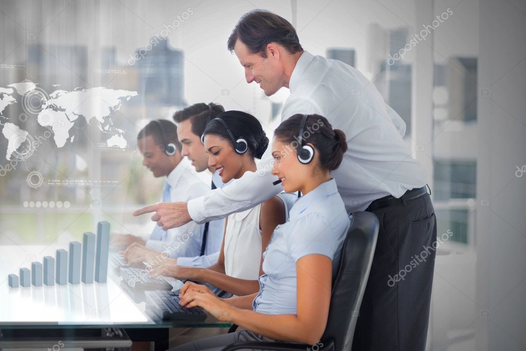 Call center employees at work on futuristic interfaces showing map and ...