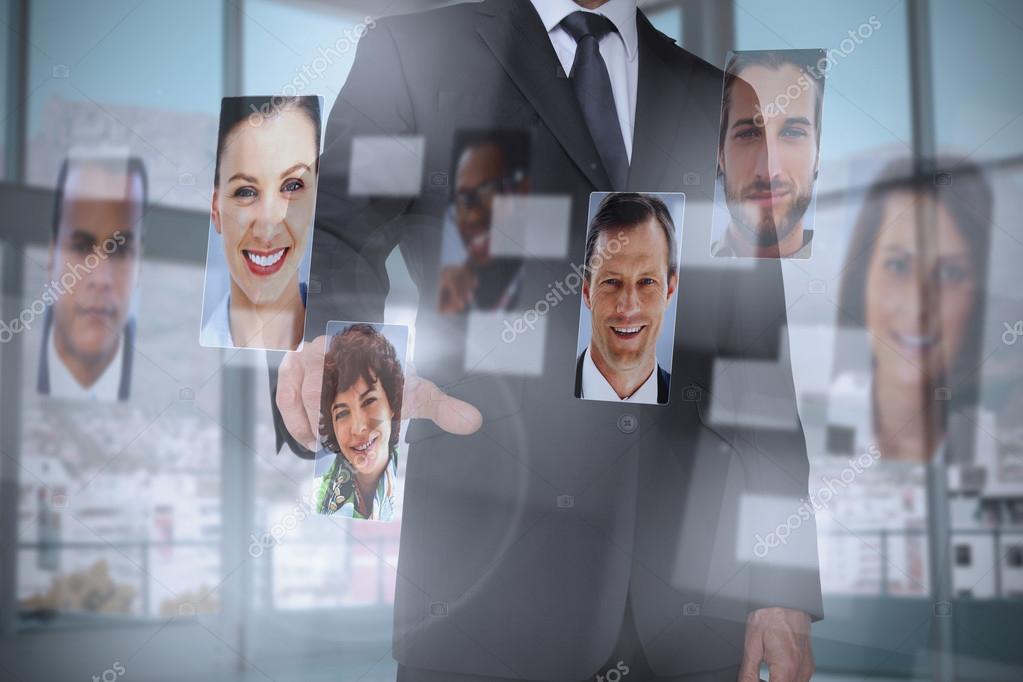 Classy businessman presenting profile pictures — Stock Photo ...