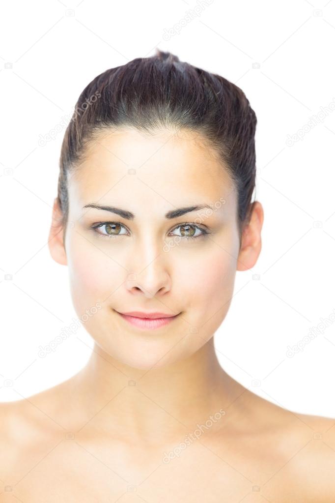 Front view of cute woman smiling at camera Stock Photo by ...