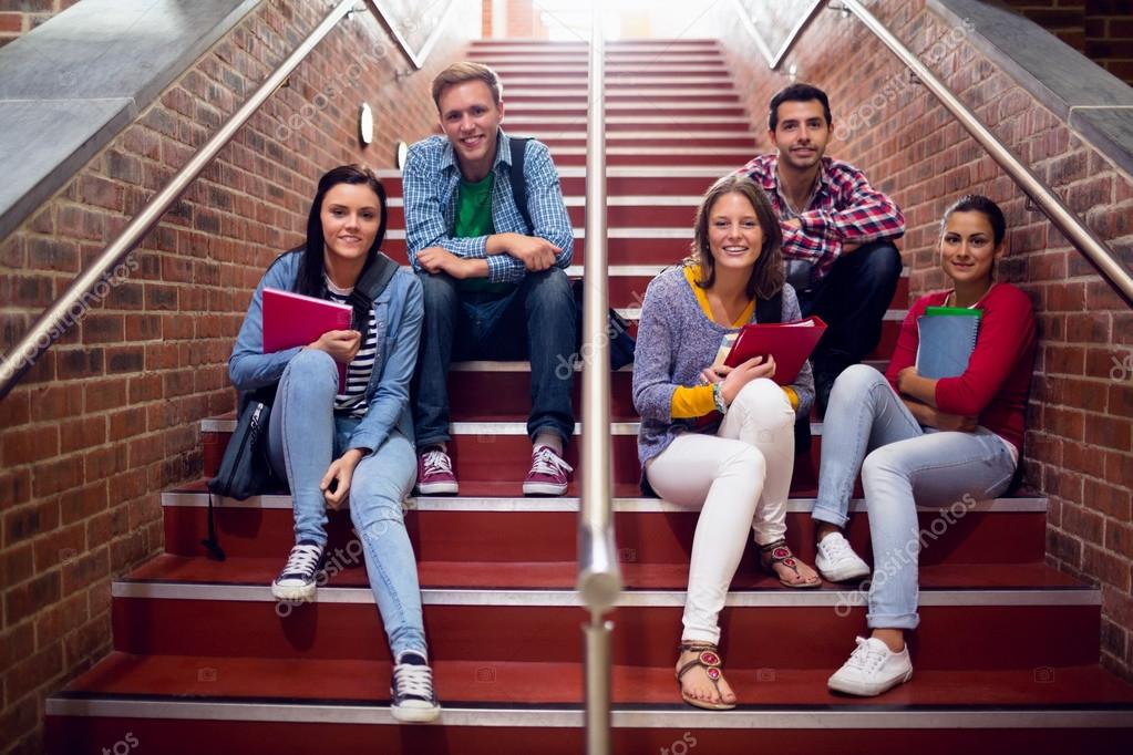 College students sitting on stairs in the college Stock Photo by ...