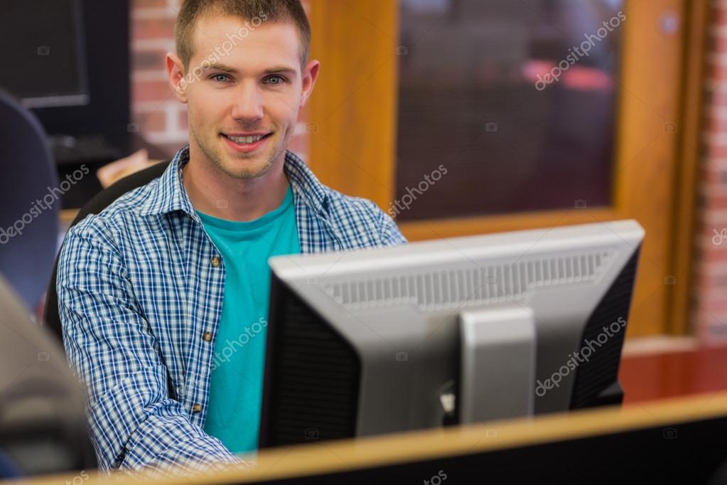 Male student using computer in the computer room — Stock Photo ...