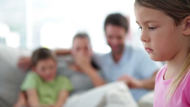 Sad little girl feeling left out of her family — Stock Video ...