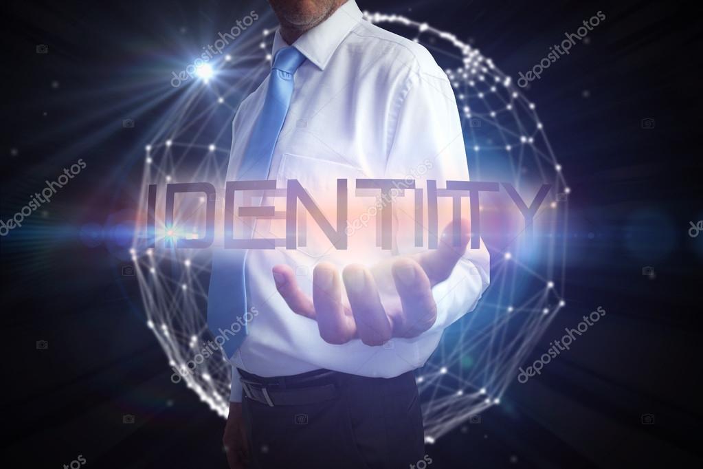 Businessman presenting the word - identity — Stock Photo ...
