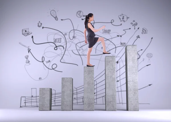 Businesswoman stepping up - Stock Image - Everypixel