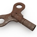 Old clock key winder isolated on white background, texture Stock Photo ...