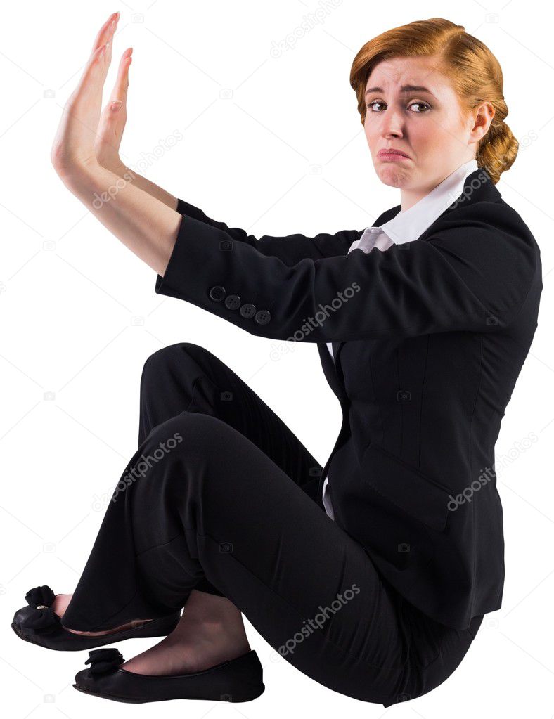 Pouting businesswoman sitting and pushing — Stock Photo ...