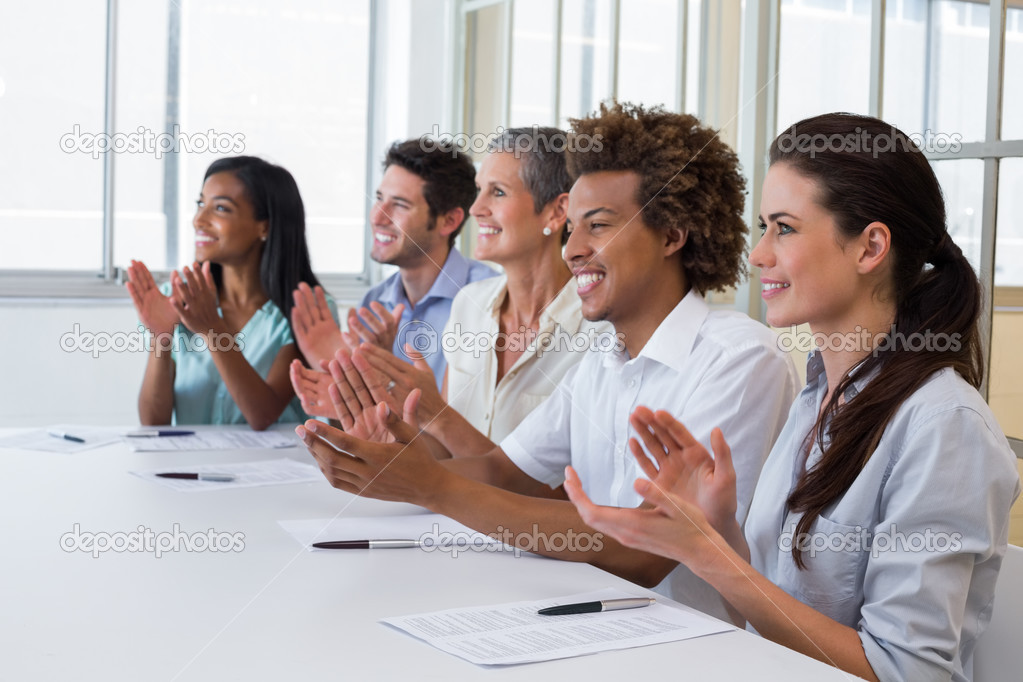 Business team clapping at presentation Stock Photo by ©Wavebreakmedia ...