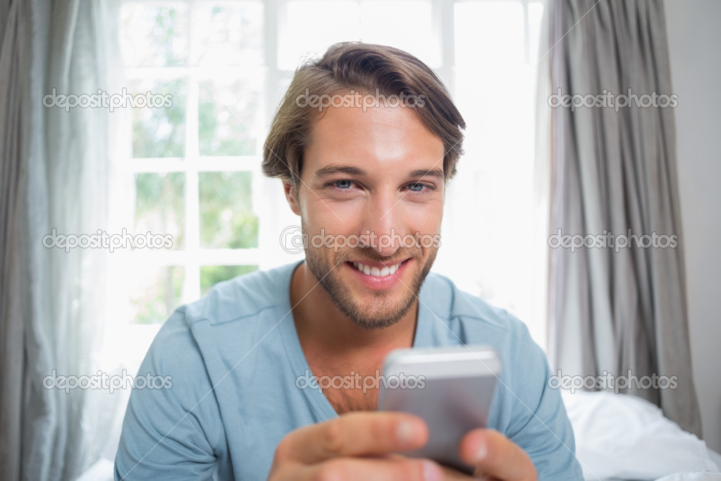 Man sending text message — Stock Photo © Wavebreakmedia #48327739