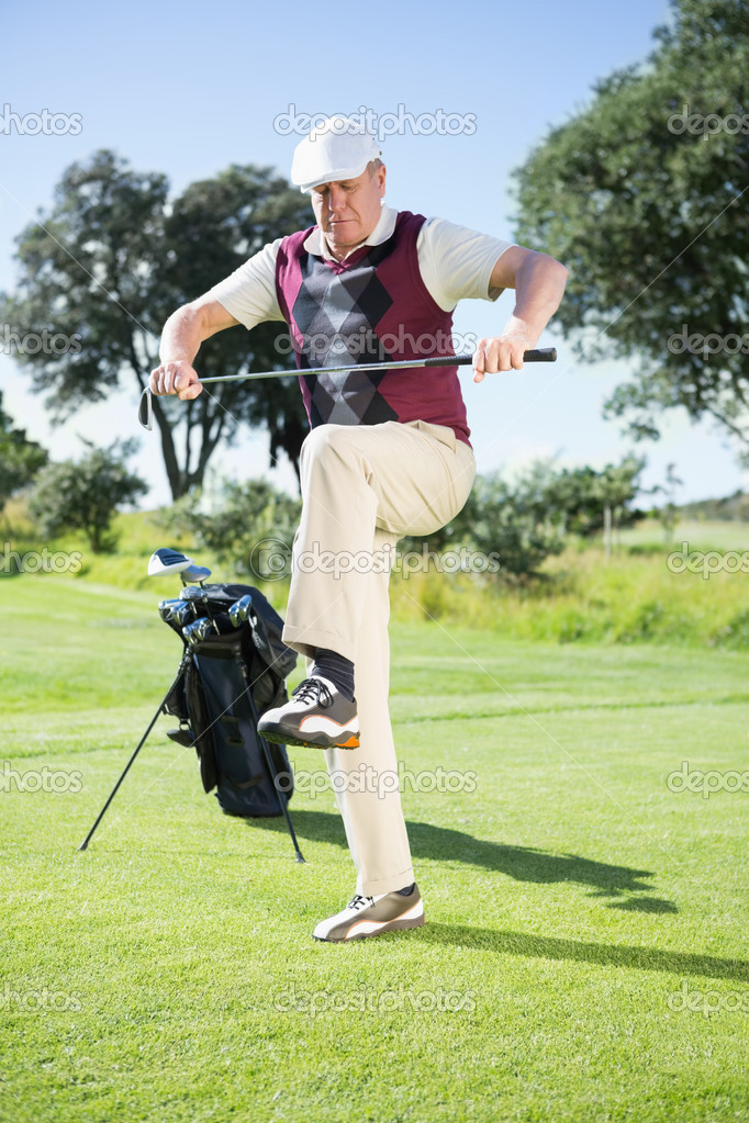 Angry golfer trying to break his club — Stock Photo © Wavebreakmedia ...