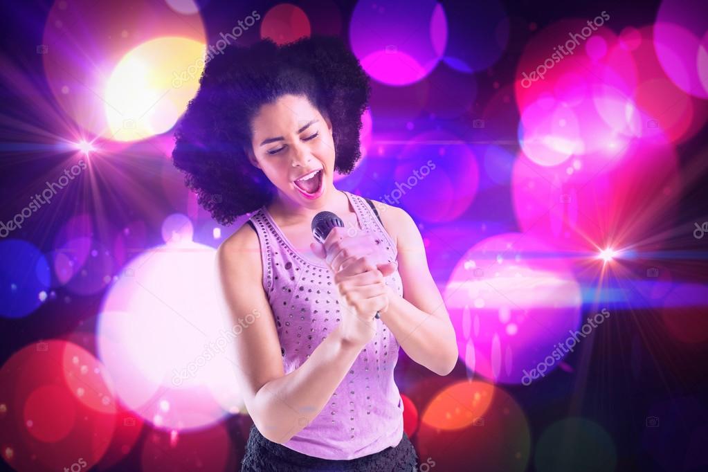 Girl singing — Stock Photo © Wavebreakmedia #49989229