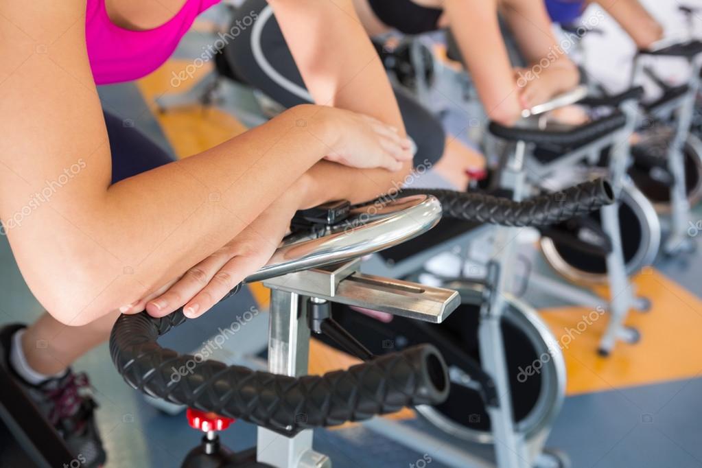Spin class working out in a row — Stock Photo © Wavebreakmedia #50048131