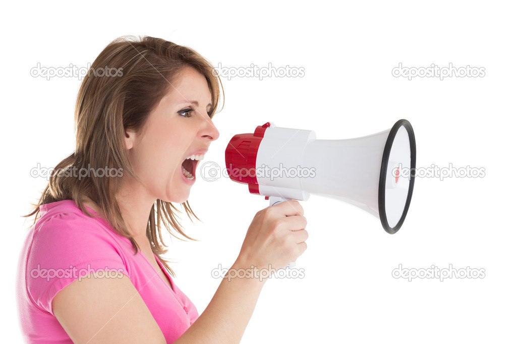 Close up side view of woman shouting into bullhorn — Stock Photo ...