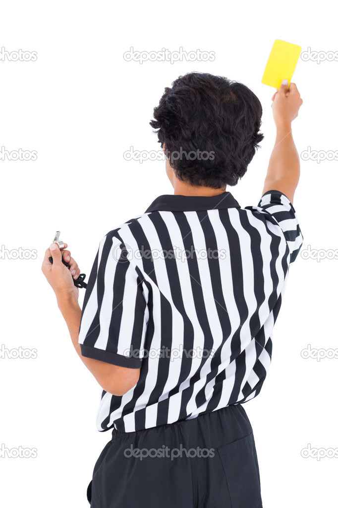 Stern referee showing yellow card — Stock Photo © Wavebreakmedia #50058529