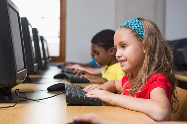 Cute pupils in computer class - Stock Image - Everypixel