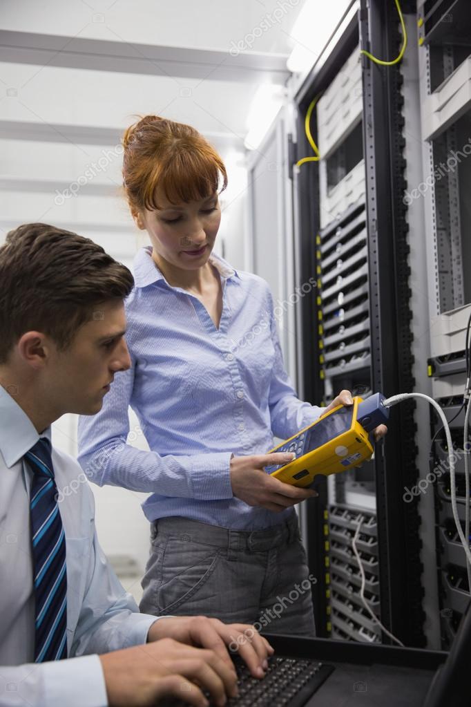 Team of technicians using digital cable — Stock Photo © Wavebreakmedia ... Team of technicians using digital cable — Stock Photo © Wavebreakmedia ...
