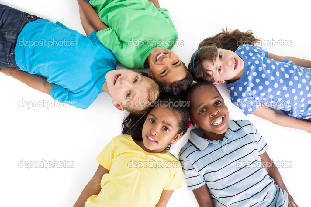 Children lying in a circle Stock Photo by ©Wavebreakmedia 51598029