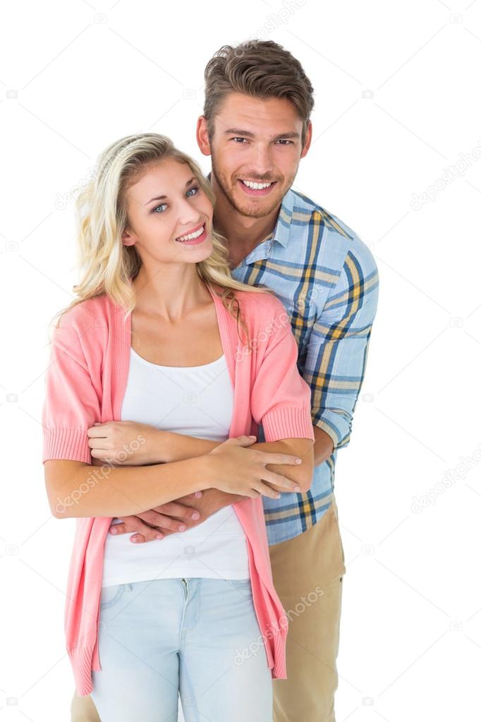 Attractive young couple smiling together — Stock Photo © Wavebreakmedia ...