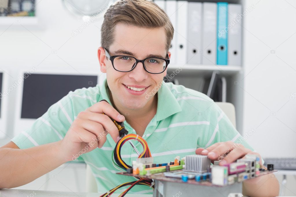 Technician working on broken cpu with screwdriver Stock Photo by ...