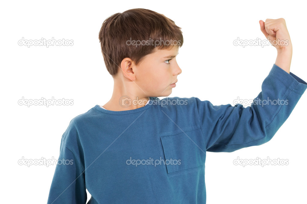 Little boy flexing his arm Stock Photo by ©Wavebreakmedia 51601027