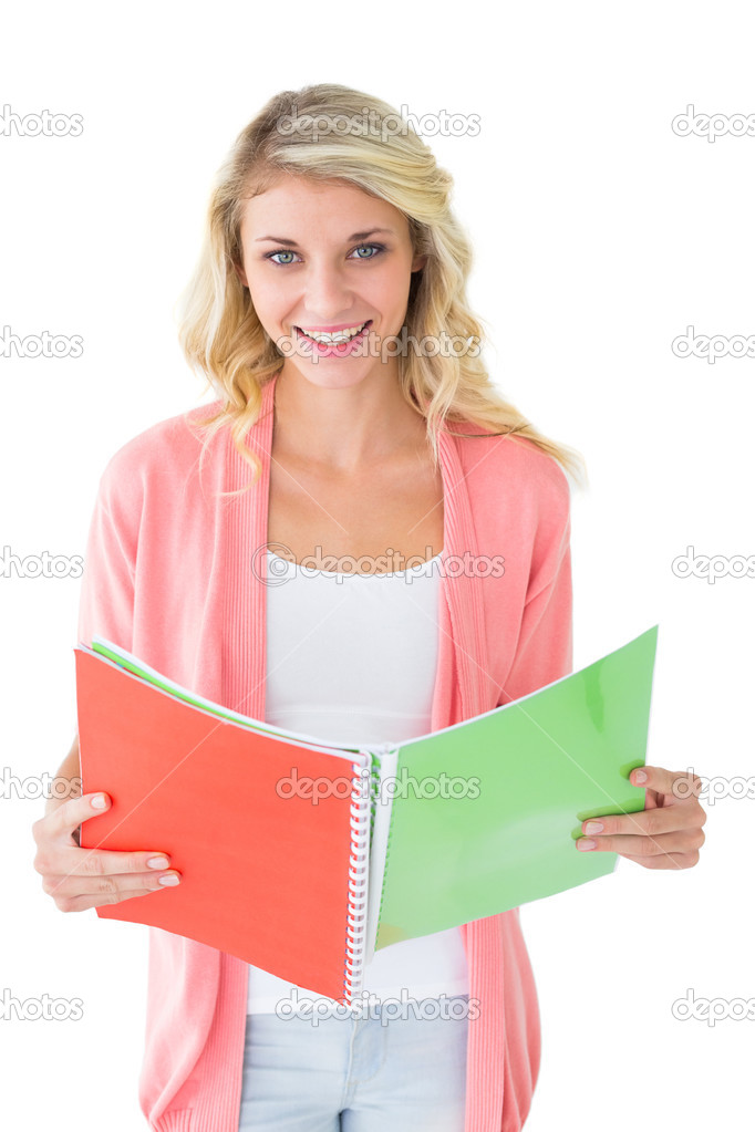 Attractive student reading from notepad Stock Photo by ©Wavebreakmedia ...