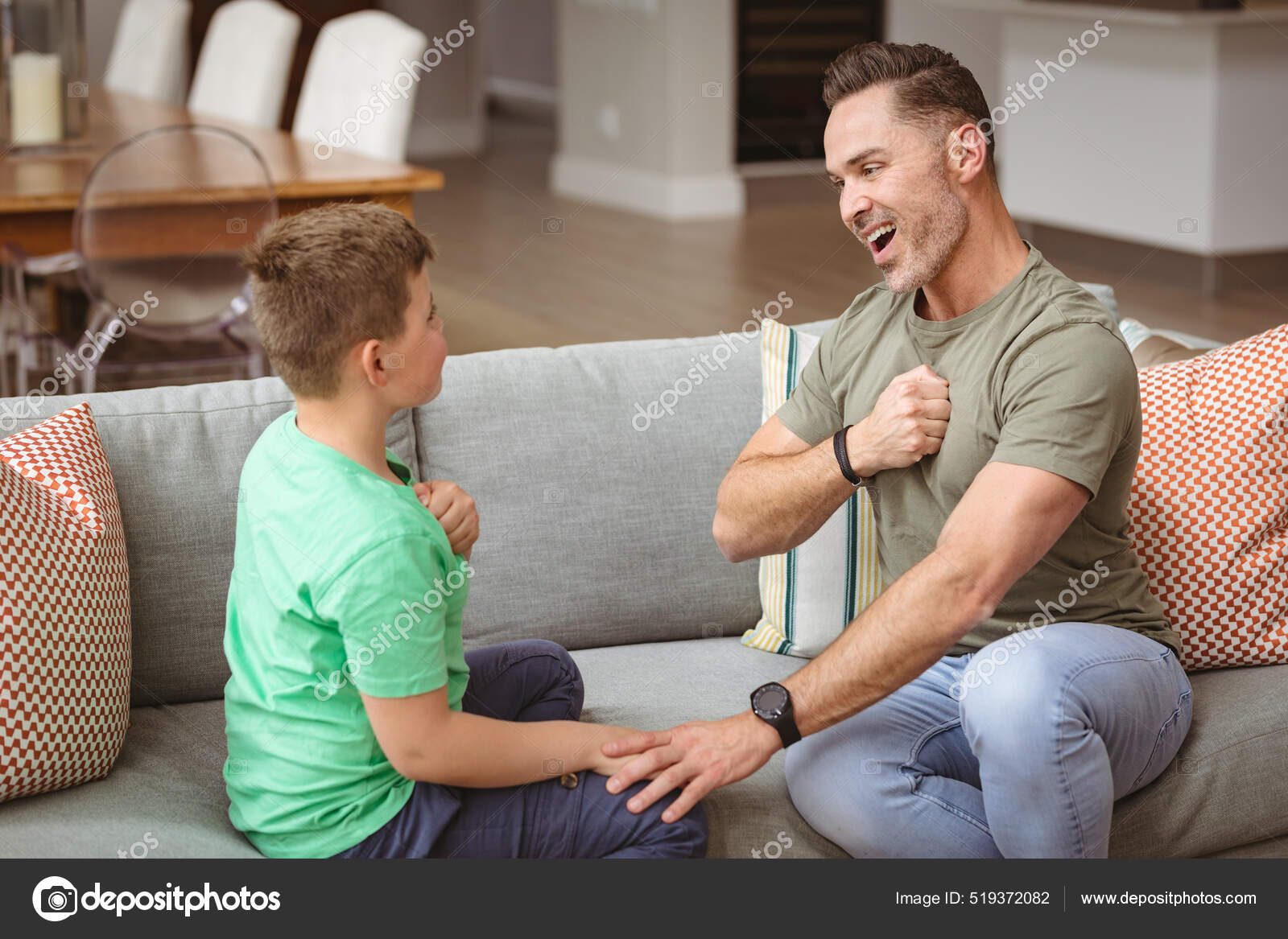Caucasian Father Son Communicating Using Sign Language While Sitting ...