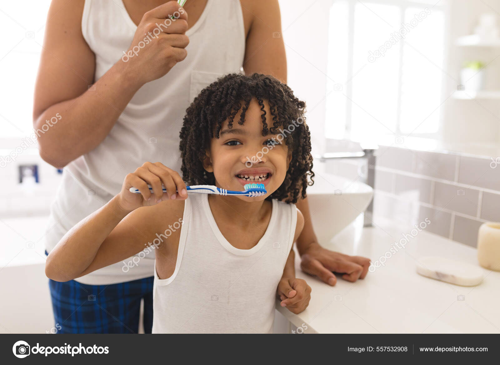 Hispanic Boy Brushing Teeth