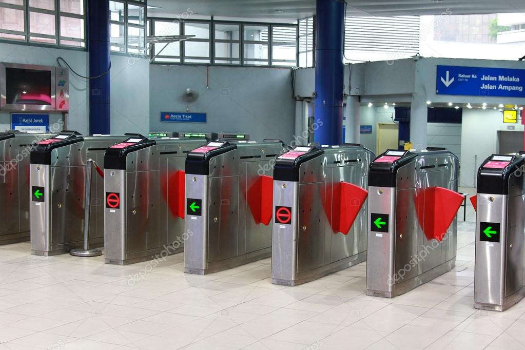 Ticket gate at Light Rapid Transit interchange station – Stock ...