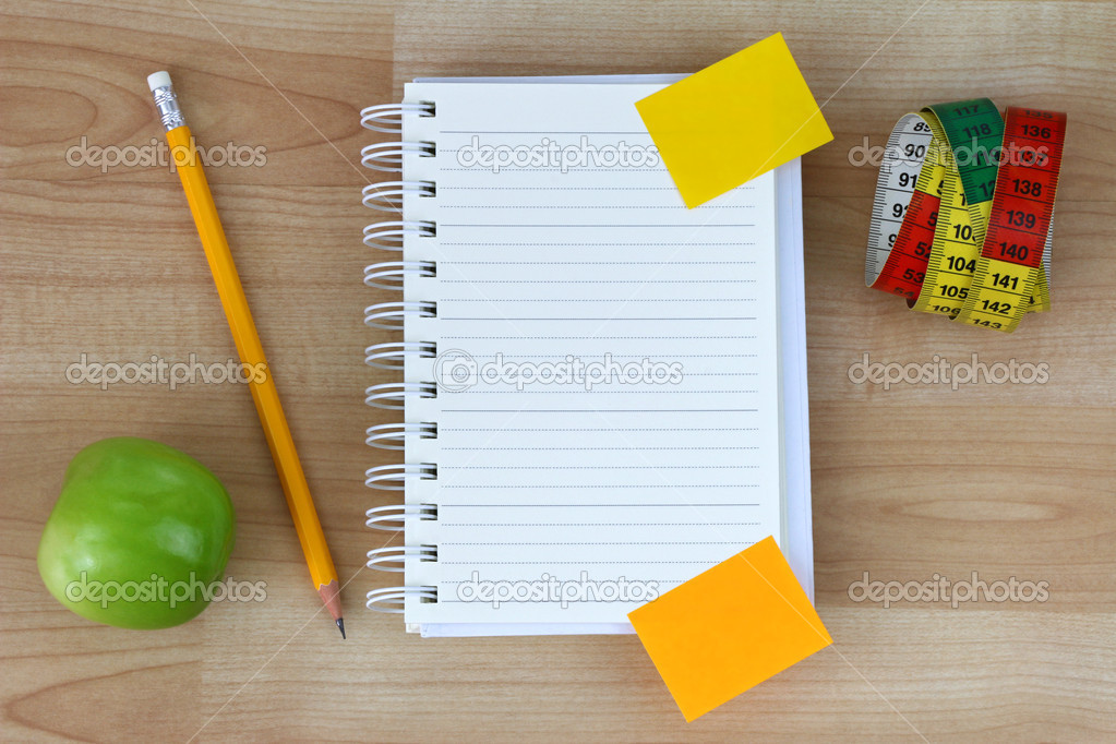 Notebook, green apple, pencil, measuring tape Stock Photo by ©sasimoto ...
