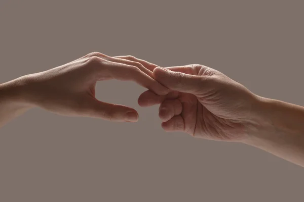 Hands Letting Go Of Each Other