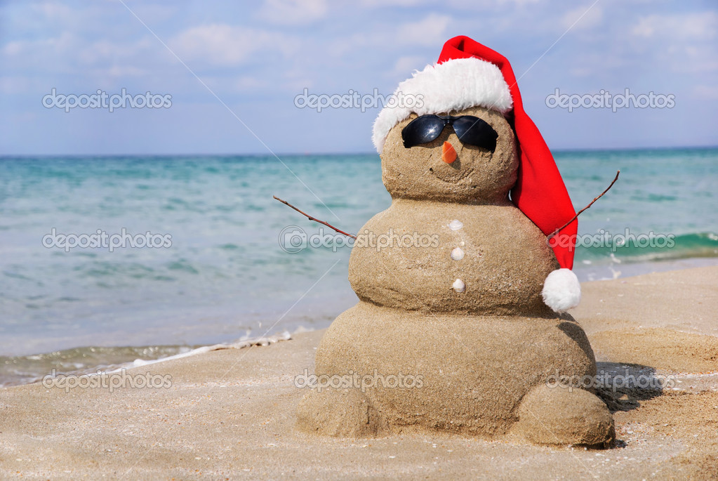 Snowman made out of sand. Holiday concept can be used for New Ye ...