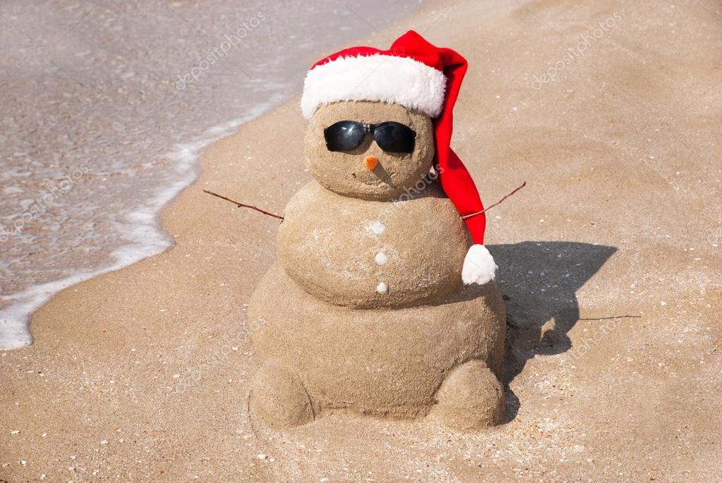 Snowman made out of sand. Holiday concept can be used for New Ye Stock ...