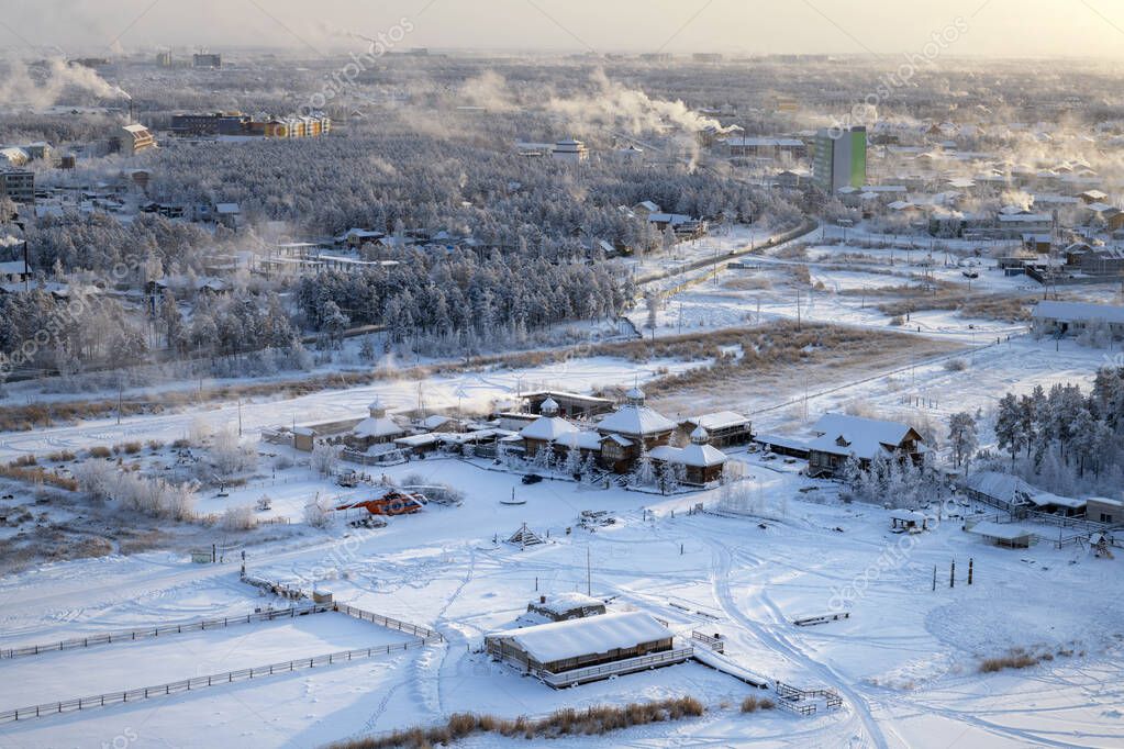 Yakutsk city on a winter day. View from a height of the ethnographic ...