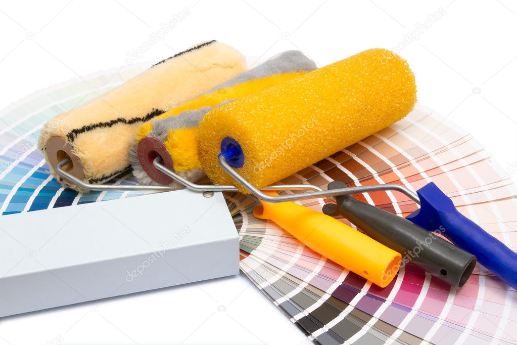 Three painting rollers and album of colors — Stock Photo © nik7ch #39992245