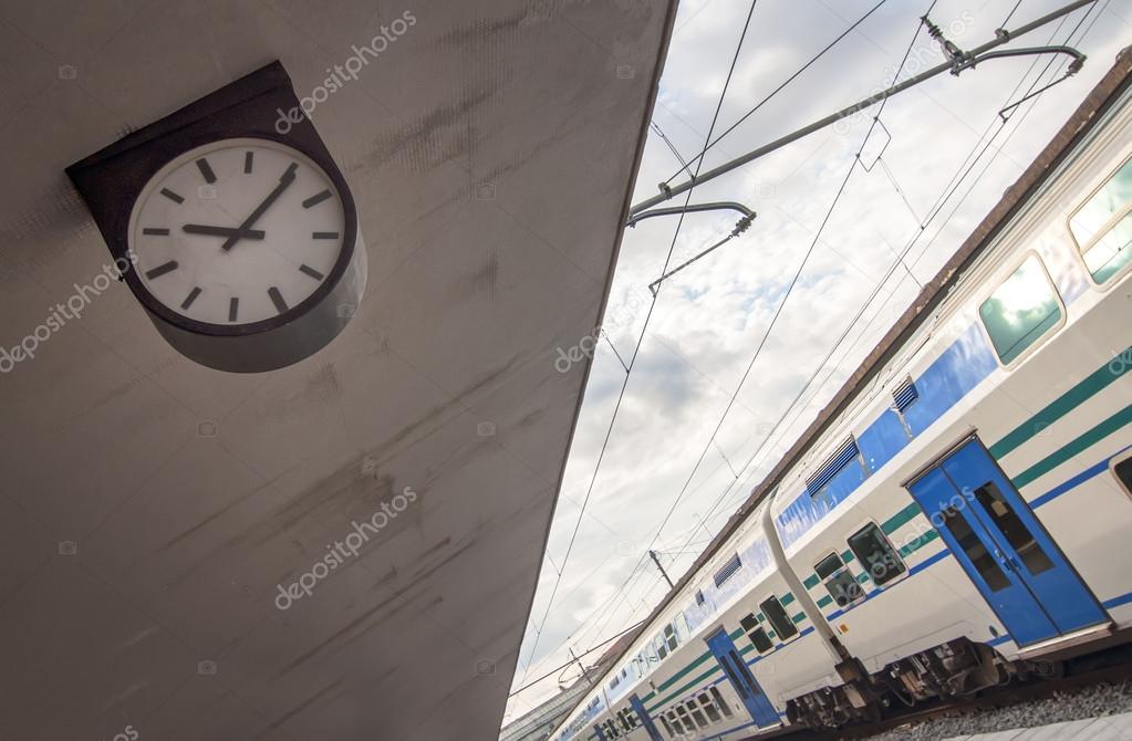 Clock on railway station Stock Photo by ©Changered 12621024
