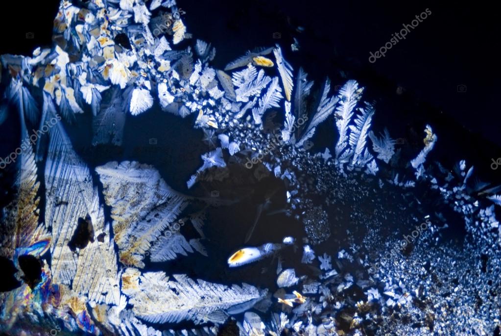 Soot particles and microcrystals in polarized light — Stock Photo ...