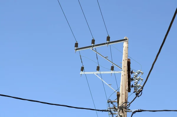 Power line post and blue sky — Stock Photo © Mirage3 #4238537