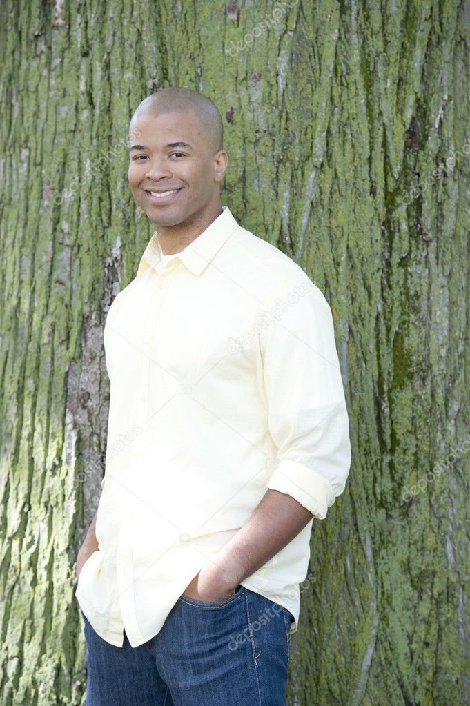 Young black man outdoors — Stock Photo © eugenef #50555715
